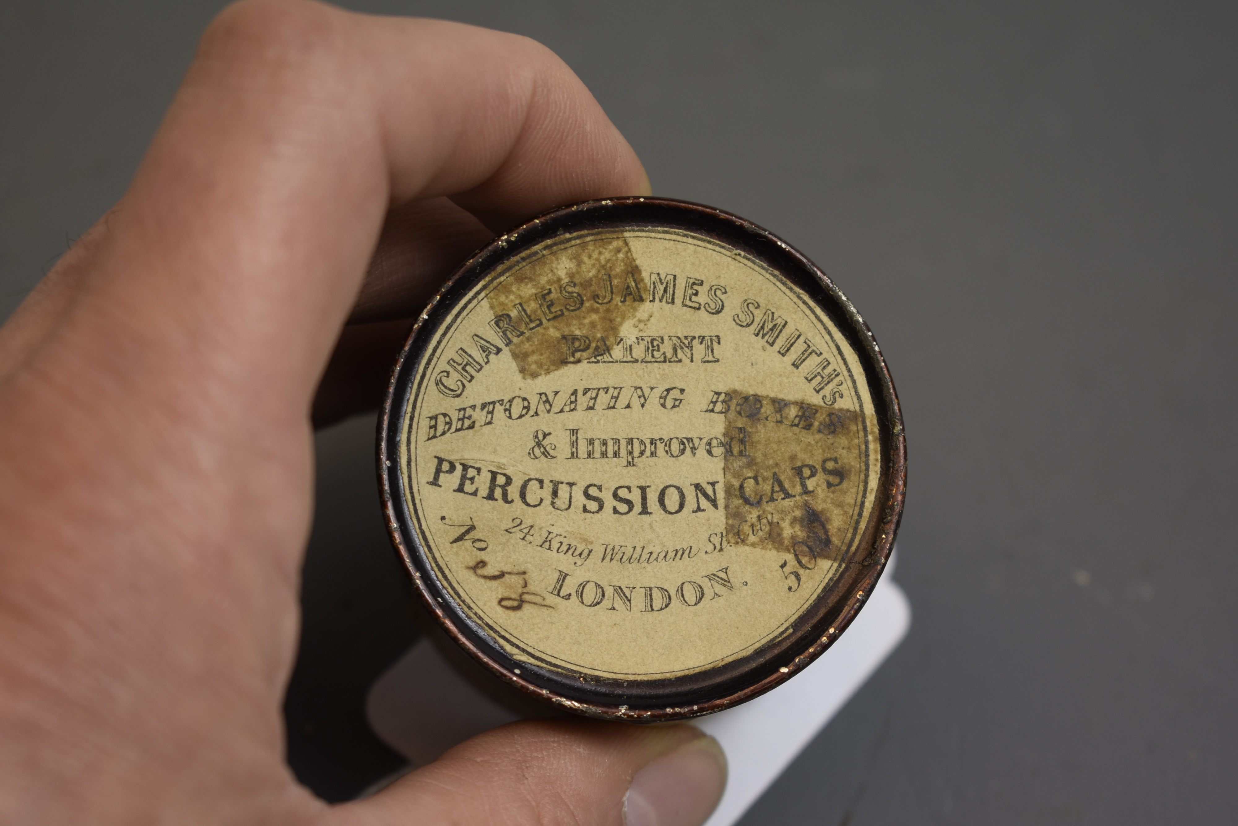 Lot 463 - A LARGE TIN OF PERCUSSION CAPS,