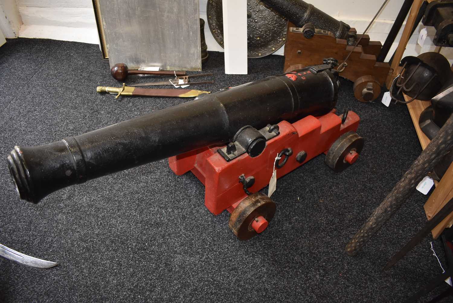 Lot 99 - A LARGE NAVAL CANNON,