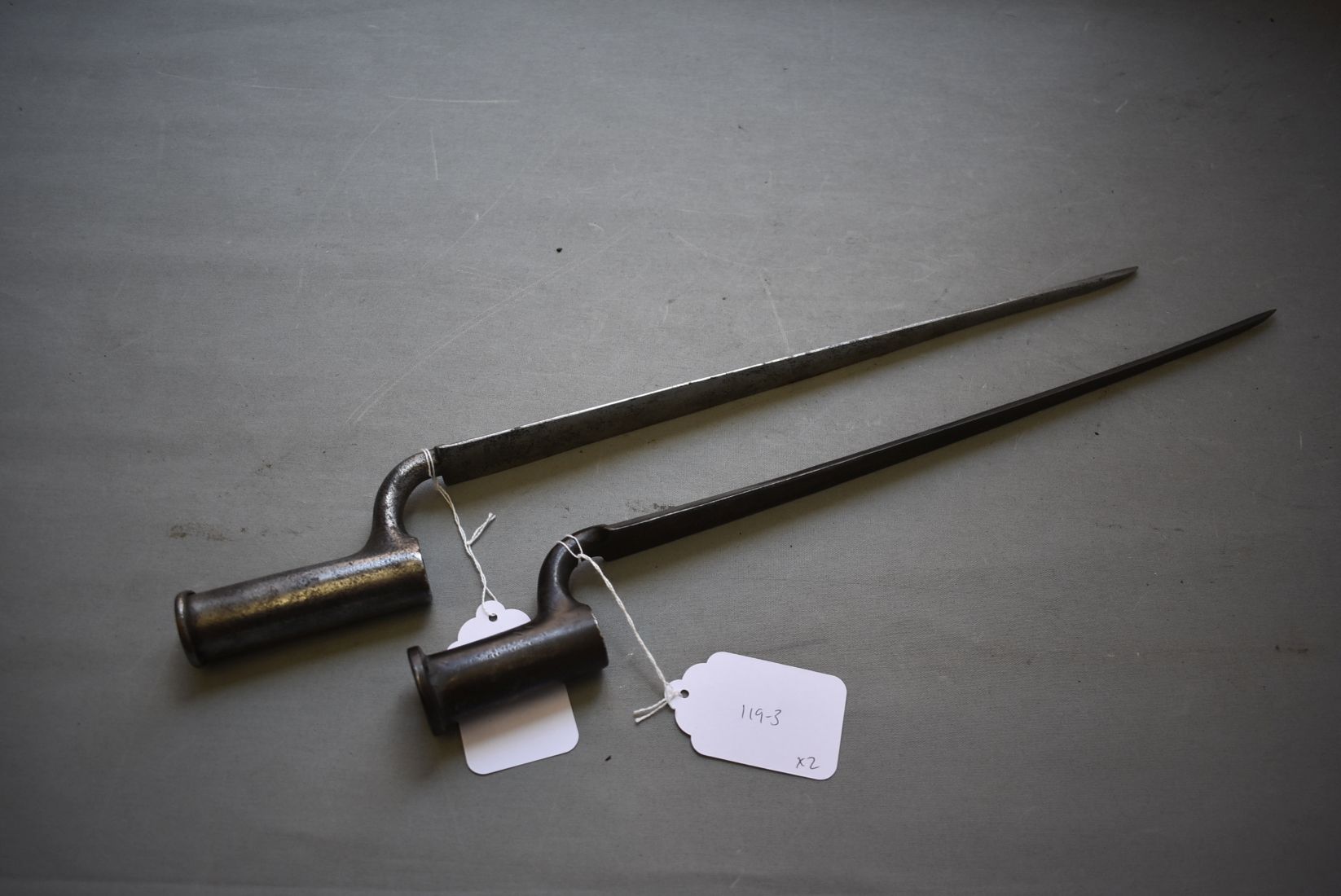 Lot 599 - TWO BROWN BESS SOCKET BAYONETS,