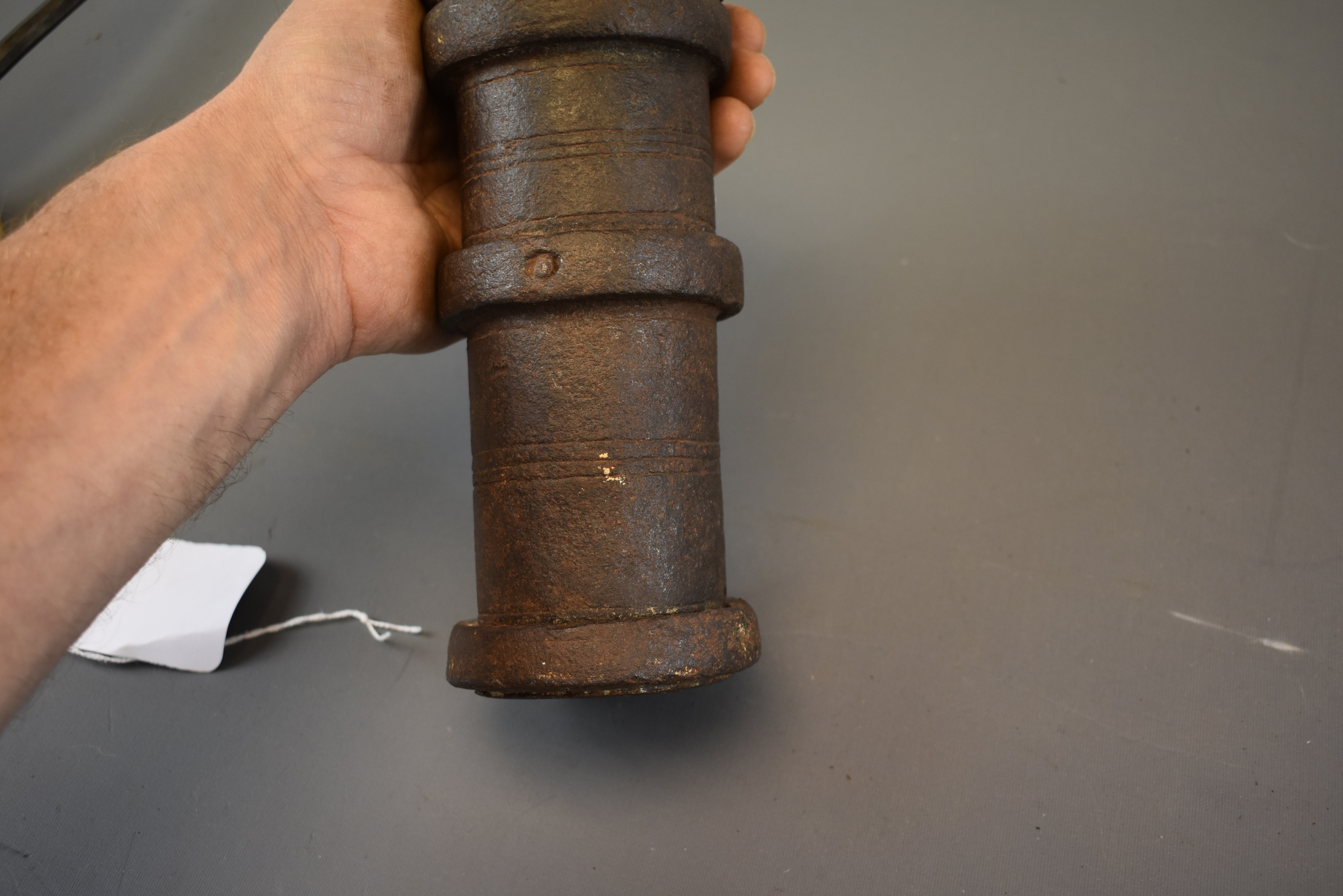 Lot 64 - A LATE 18TH CENTURY INDIAN CAST IRON MORTAR,