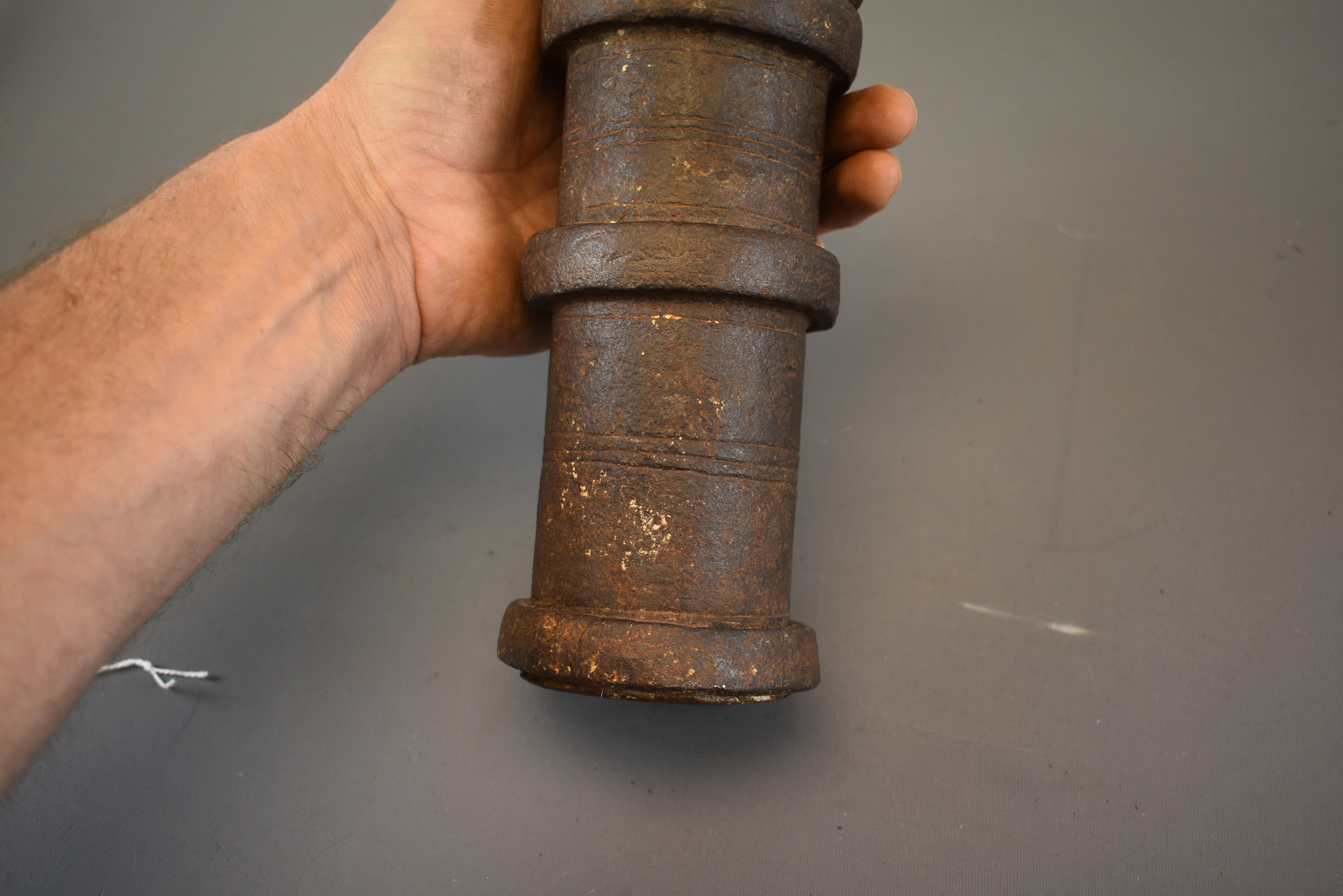 Lot 64 - A LATE 18TH CENTURY INDIAN CAST IRON MORTAR,