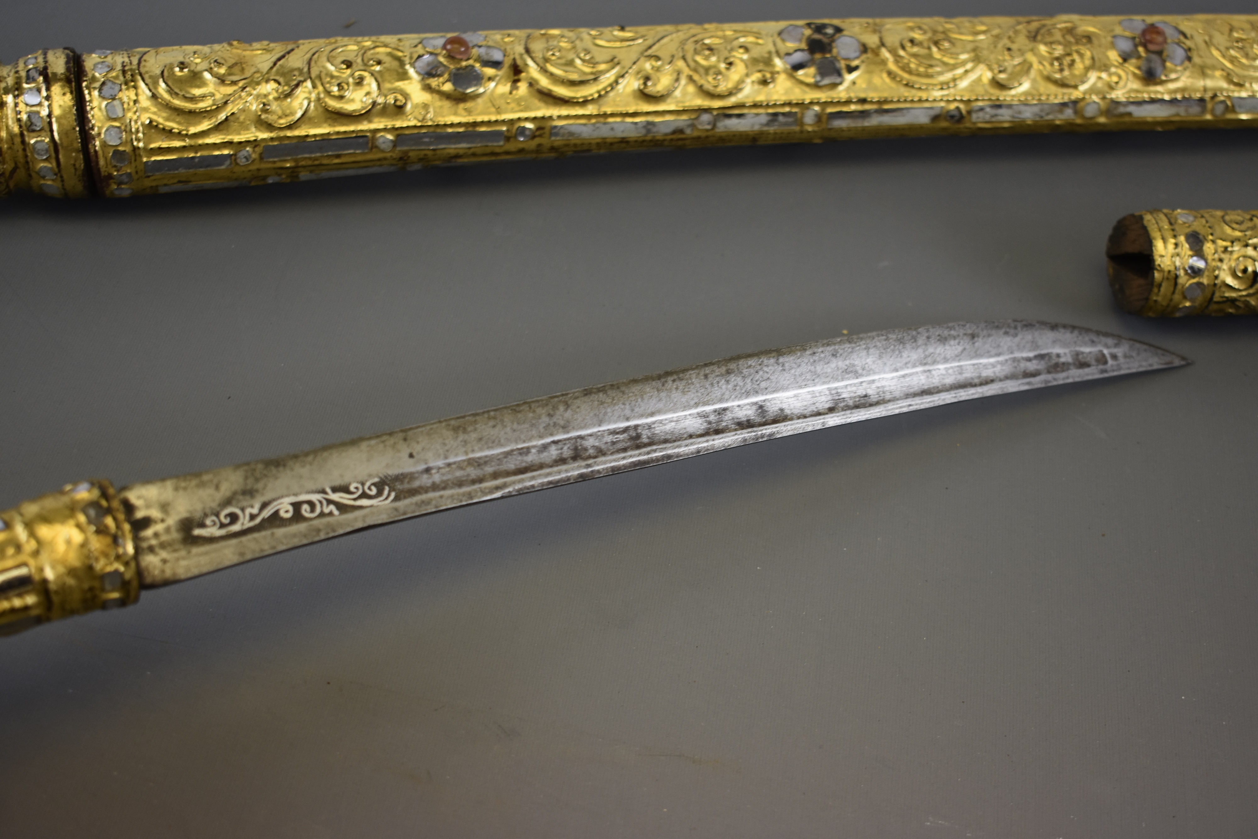 Lot 28 - A BRACE OF ORNATE GILT THAI TEMPLE SWORDS,