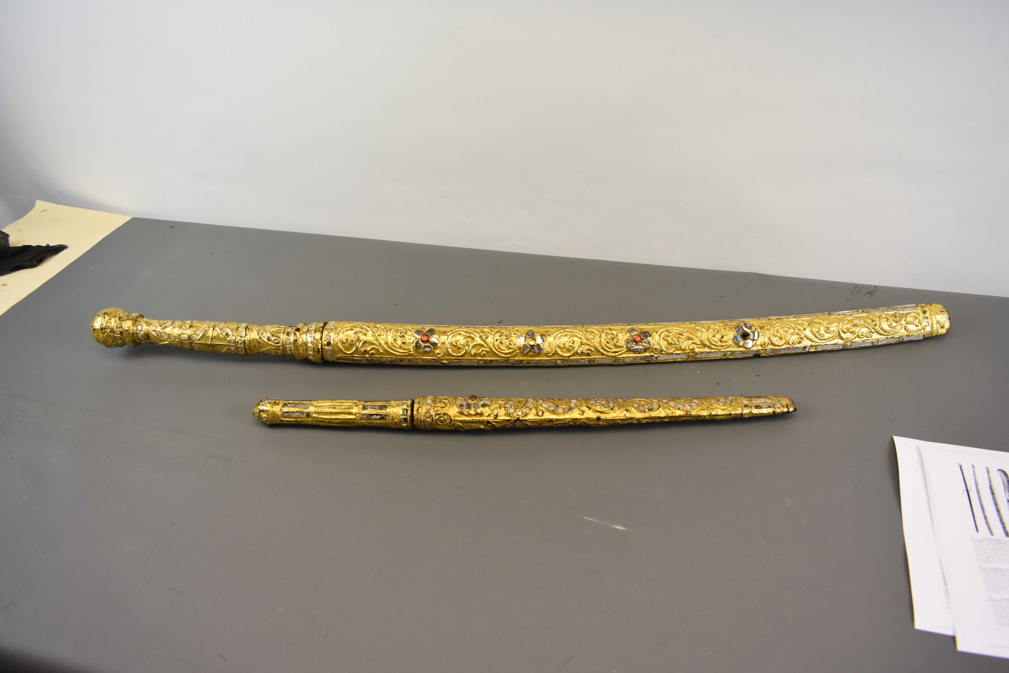 Lot 28 - A BRACE OF ORNATE GILT THAI TEMPLE SWORDS,