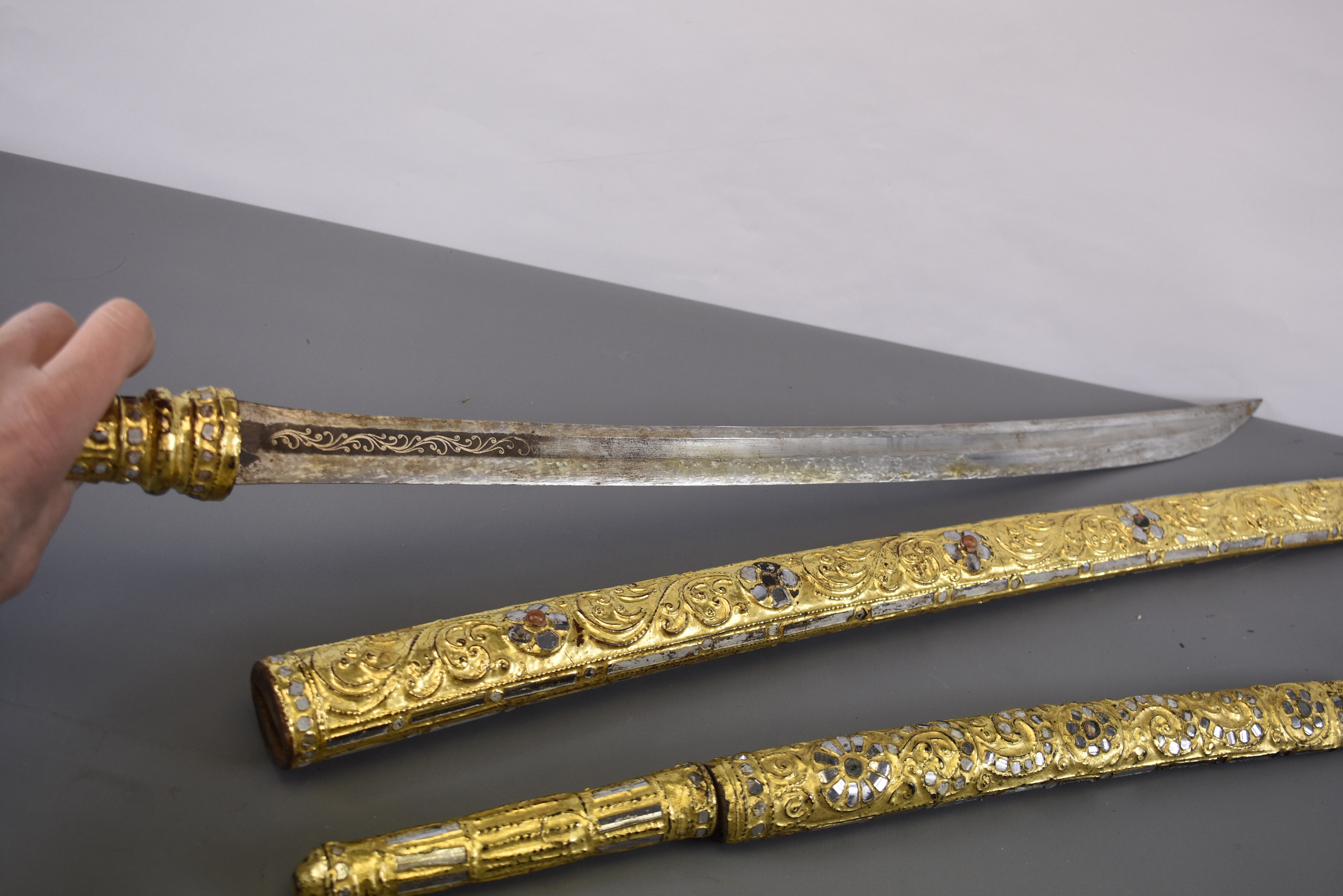 Lot 28 - A BRACE OF ORNATE GILT THAI TEMPLE SWORDS,
